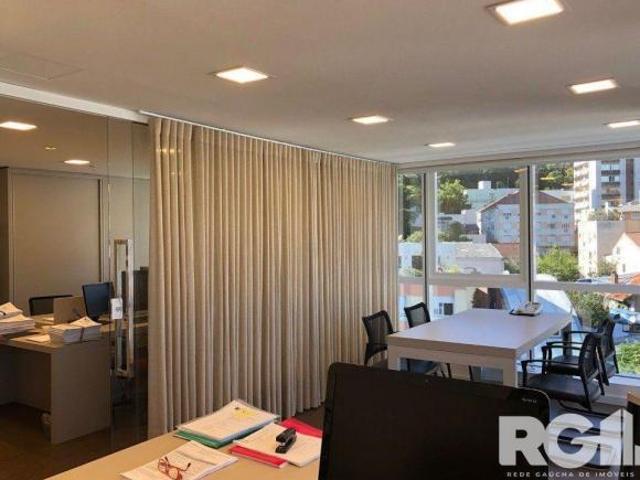 Sala para alugar totalmente mobiliada e decorada, 52 m² privativos divididos em 2 ambientes com vaga