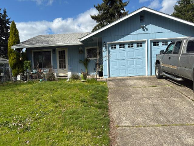 SE Spruce St
