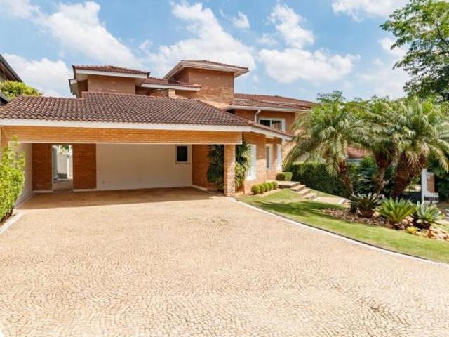 Aconchegante casa em condomínio para venda e locação com 4 quartos, sendo 4 suítes, 500m²