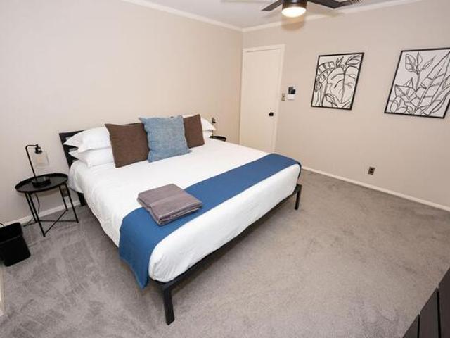 Set in a peaceful South Austin neighborhood, this cozy home blends easy going style with function