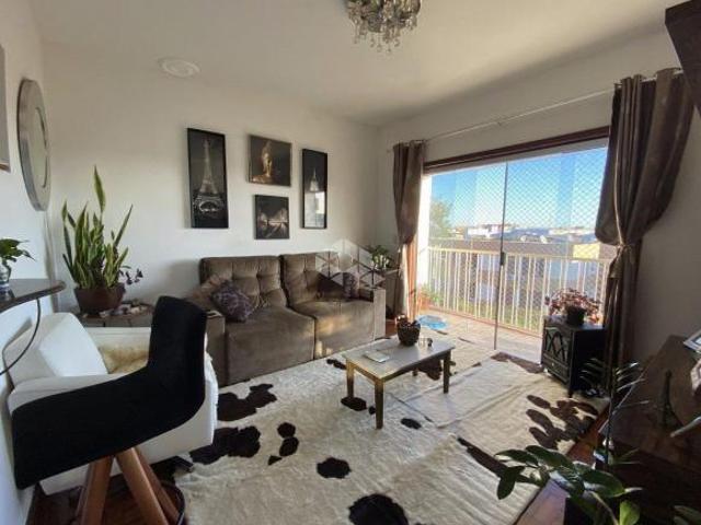 Seu Novo Lar em Canoas: Apartamento com 3 Dormitórios, Sacada e Móveis Planejados