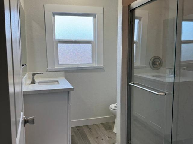 Single room shared bathroom and kitchen