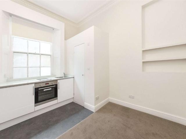 Situated in the desirable location of Cranley Place in the heart of South Kensington, this studio flat has its own kitchenette and shared bathroom facilities