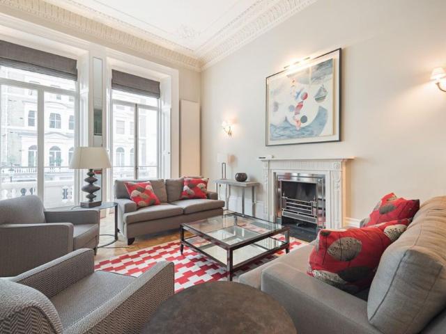 Situated on the first floor of a handsome Victorian conversion on the highly coveted residential address of Queen’s Gate Place, SW7