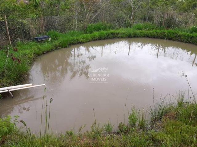 Sítio 12.000m² com lagoa e nascente em Passa Tempo Mg