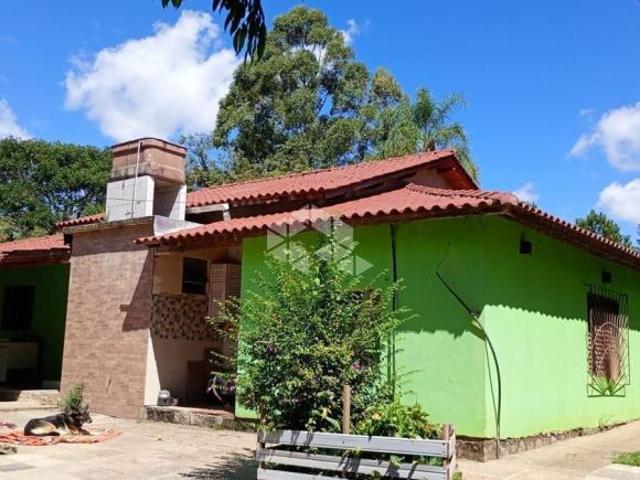 Sítio à venda no Parque Eldorado, com casa de 2 quartos, garagem coberta e outras benfeitorias