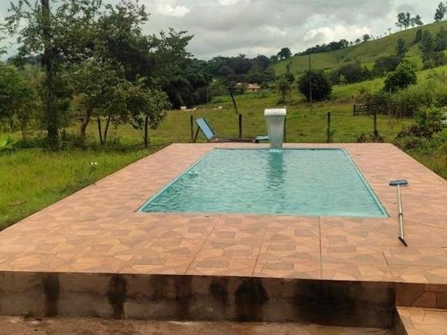 SÍTIO COM LAGOA À VENDA PORTEIRA FECHADA 4 QUARTOS COM SUÍTE R$ 350 MIL OPORTUNIDADE ÚNICA