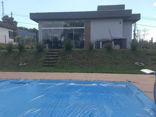 SITIO EM CONDOMINIO FECHADO