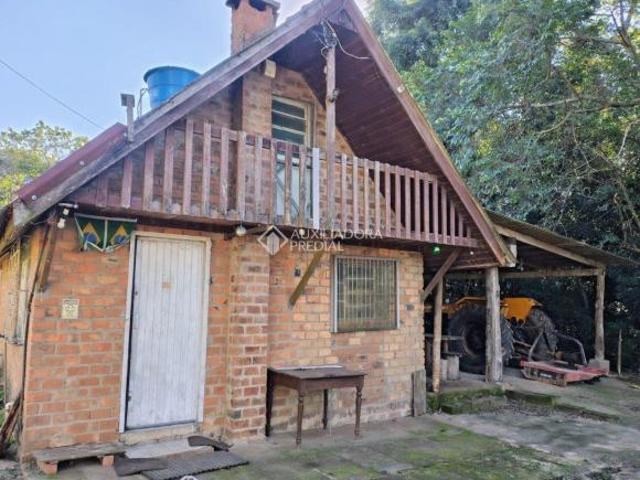 Sítio em Itapuã com 96.750 m2, cabana, casa de caseiro, trator