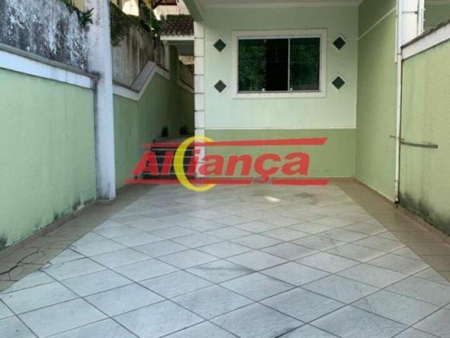 Sobradão geminado, Bosque Maia, 2 vagas, 2 salas, 3 dormitórios 1 suite, escritório e churrasq