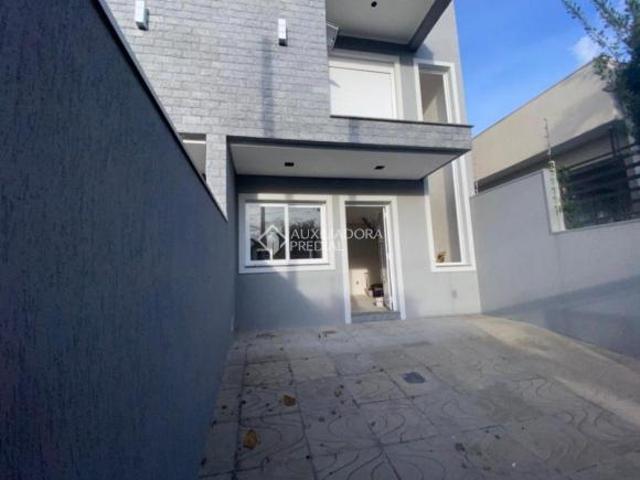 Sobrado Moderno com Excelente acabamento e com 3 quartos à venda no bairro Igara em Canoas