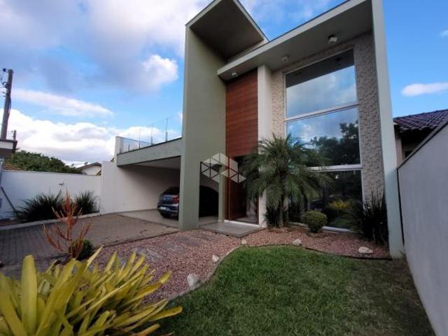 Sobrado moderno com 2 suítes, solarium e pátio Bairro Scharlau, São Leopoldo