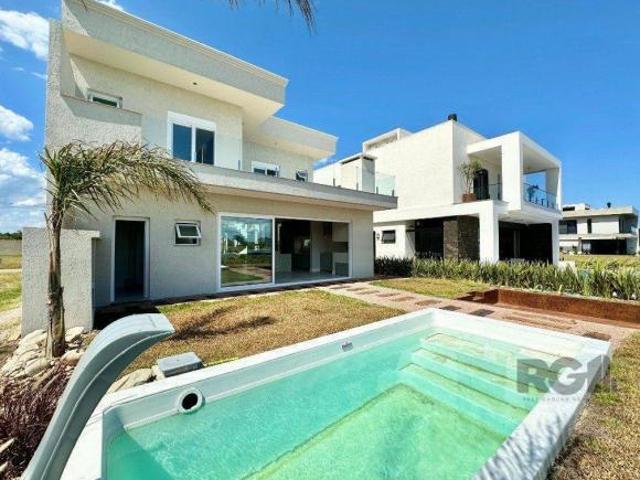 SOBRADO NEOCLÁSSICO À VENDA A BEIRA LAGO COM VISTA INCRÍVEL E JUNTO AO MAR