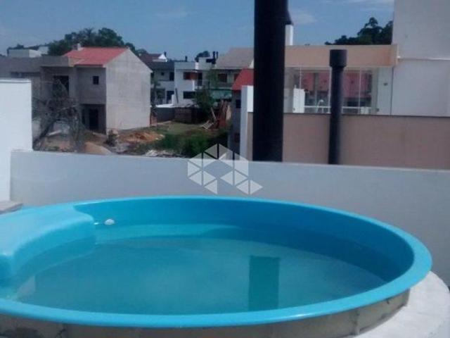 Sobrado no bairro Hípica em Porto Alegre com 4 dormitórios