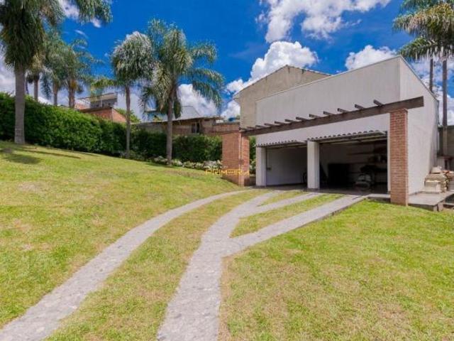 Sobrado no condomínio Mosel Ville no Uberaba com 450 m² útil e amplo terreno