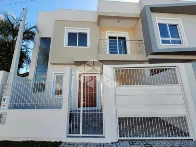 Sobrado novo 3 dormitórios com 1 suíte no bairro Nossa Sra das Graças