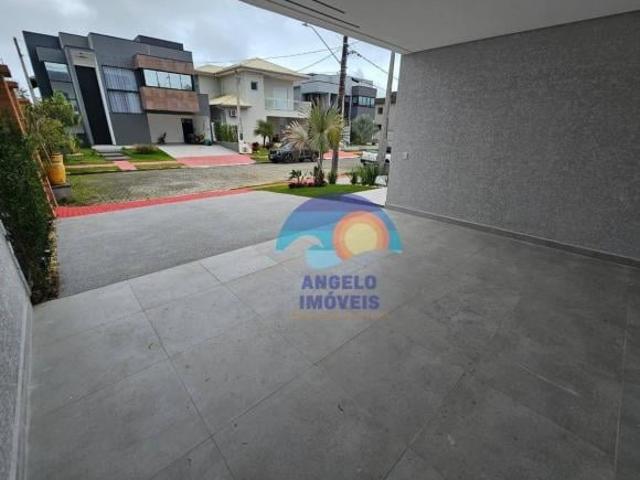 Sobrado novo com piscina 4 suítes à venda Condomínio Flora Rica Peruíbe/SP
