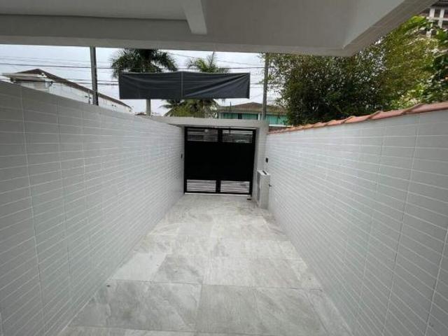 Sobrado novo com 3 dormitórios à venda, 104 m² por R$ 800.000 Vila Belmiro Santos/SP