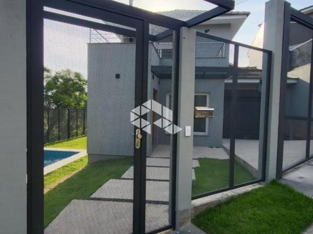Sobrado NOVO de 210m² com vista para o Guaíba!