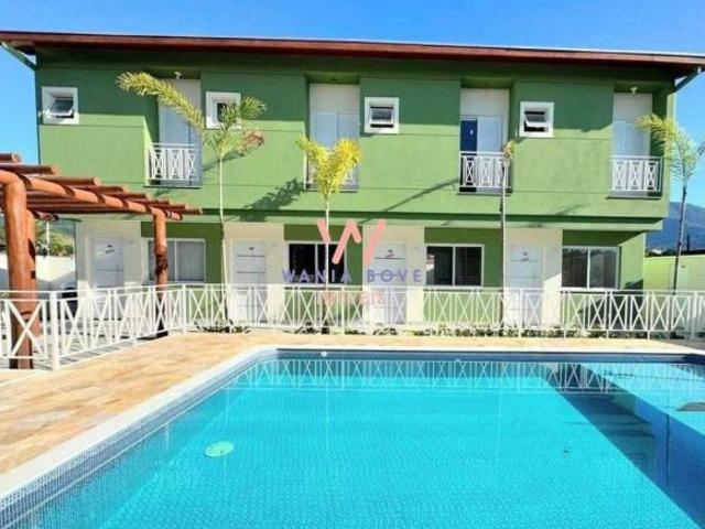 Sobrado a 450m da Praia, com 2 dormitórios à venda, 97m² por R$495.000 Capricórnio III Caraguata
