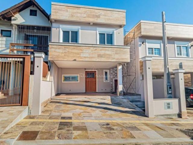 Sobrado à venda – 3 dormitórios, suíte, lareira e churrasqueira Reserva Bela Vista Gravataí RS