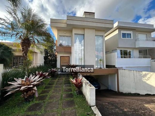 Sobrado à venda, 4 suítes, 6 banheiros, 4 vagas de garagem, Área gourmet com churrasqueira, Condomín