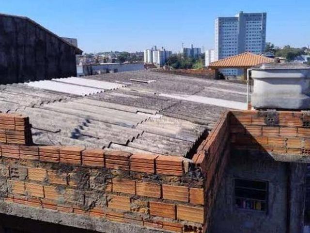 Sobrado à Venda com Duas Casas e Vaga de Garagem Coberta