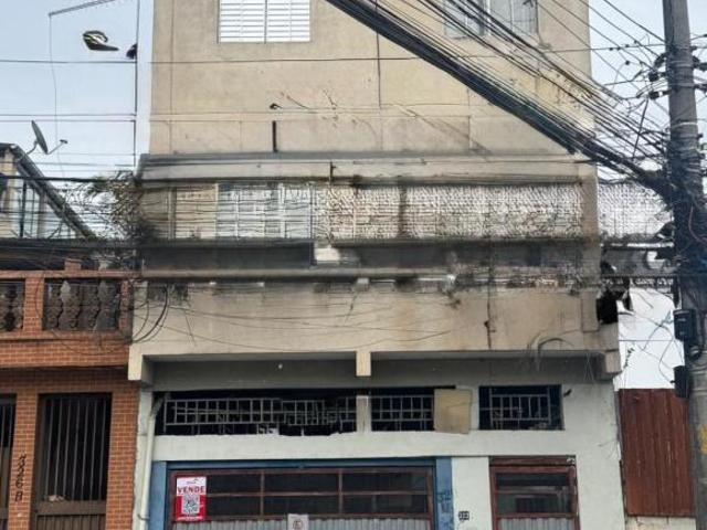 Sobrado à venda com 10 casas de aluguel Jardim Clementino Taboão da Serra/SP 500m²