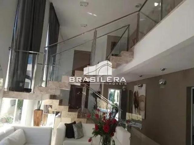 Sobrado à venda, com 4 suítes com 409,50m² no Jardins Madri, Goiânia, GO
