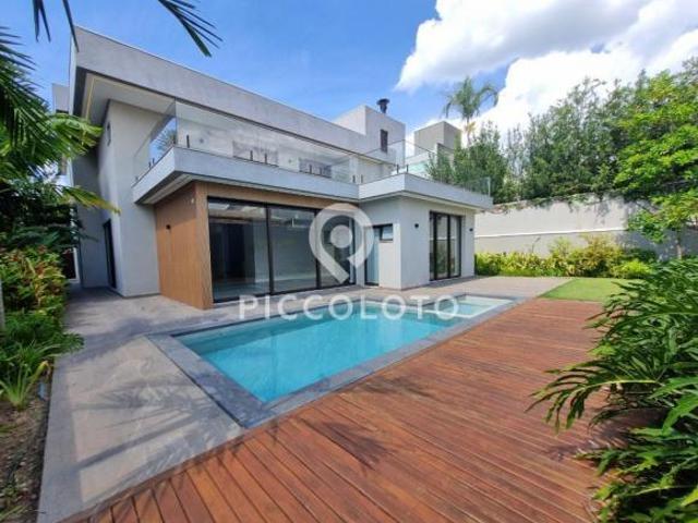 Sobrado à venda em Campinas, Loteamento Alphaville Campinas, com 4 suítes, com 497 m²