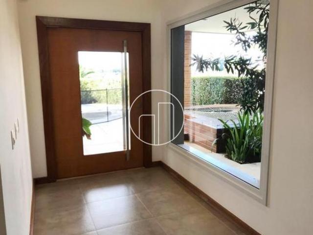 Sobrado à venda em Campinas, Residencial Parque das Araucárias, com 4 suítes, com 381.13 m²