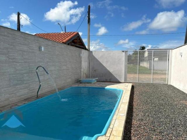 Sobrado à venda em Guaratuba PR, no bairro Coroados, porteira fechada com 4 quartos, 2 banheiros e