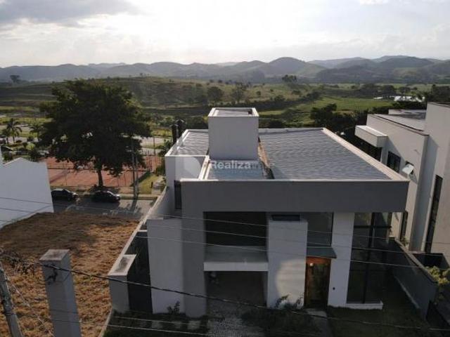 Sobrado à venda em São José dos Campos, Condomínio Residencial Jaguary, com 4 suítes, com 500 m²