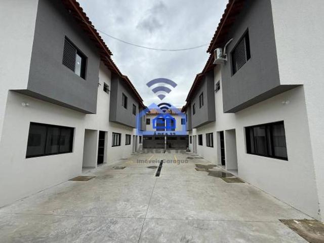 Sobrado à venda no bairro Cidade Jardim em Caraguatatuba, SP Conforto e praticidade no seu novo la