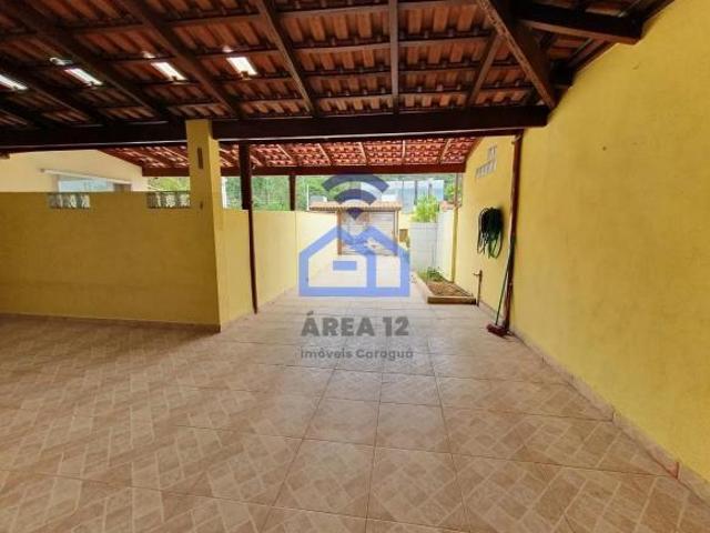 Sobrado à venda no bairro do Massaguaçu em Caraguatatuba, SP com 219m², 4 dormitórios, sendo 1 suí