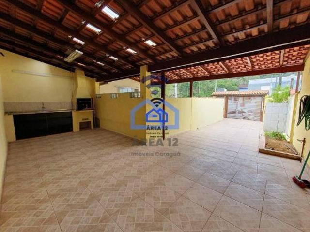 Sobrado à venda no bairro do Massaguaçu em Caraguatatuba, SP com 219m², 4 dormitórios, sendo 1 suí