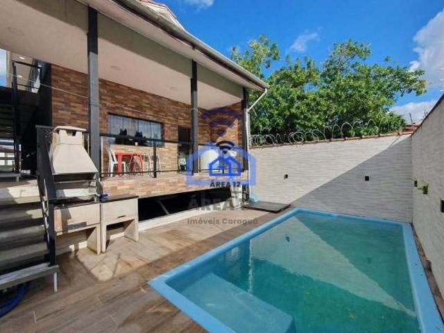 Sobrado à venda no bairro do Aruan em Caraguatatuba, SP Com 7 dormitórios e piscina!