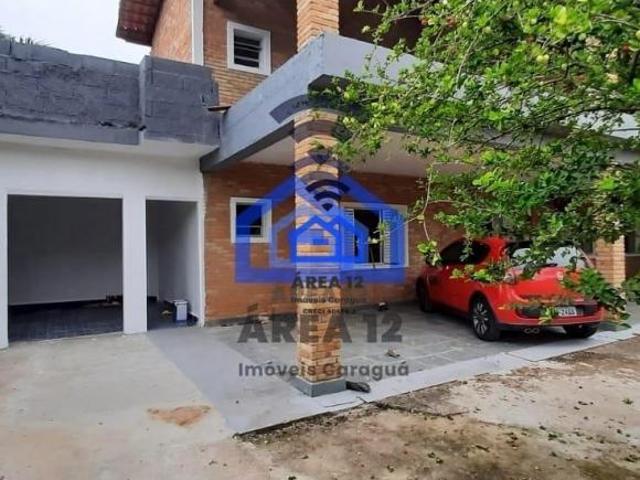 Sobrado à venda no Bairro Porto Novo 5 suítes, 2 salas amplas, cozinha, 6 banheiros, garagem para