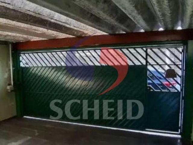 Sobrado a venda sendo 3 dormitórios e 2 vagas de garagem na região de interlagos