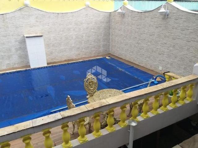 SOBRADO ALTO PADRÃO NA VILA GALVÃO, COM PISCINA
