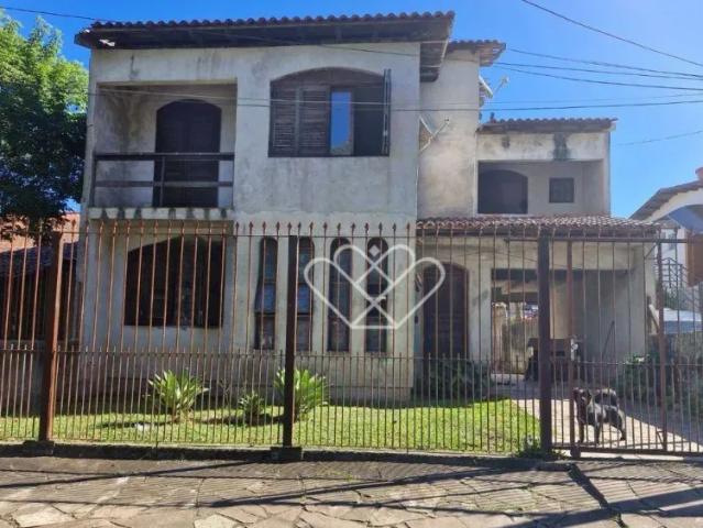Sobrado Amplo com Suíte e 3 Vagas no Centro – Conforto e Localização Privilegiada