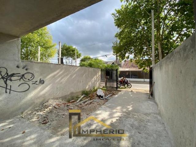 Sobrado à venda em Curitiba PR, bairro Cidade Industrial: 3 quartos, 1 sala, 2 banheiros, garagem, 7