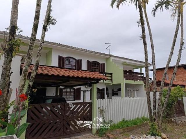 sobrado com 4 apartamentos á venda em Guaratuba