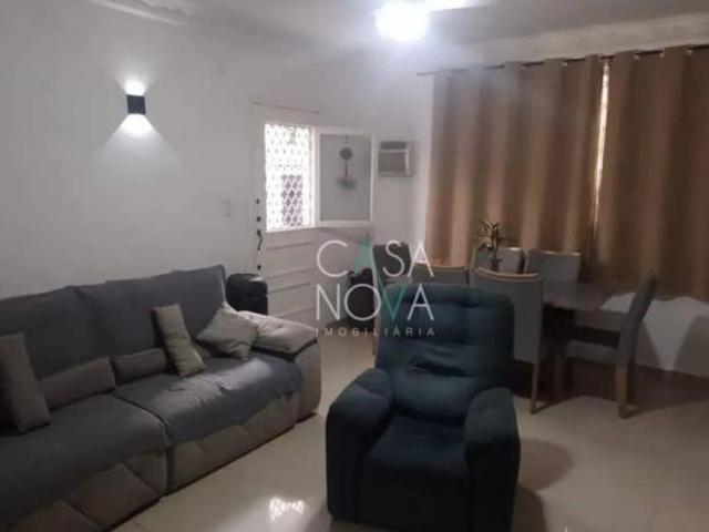 Sobrado com 4 dormitórios à venda, 120 m² por R$ 640.000,00 Gonzaga Santos/SP