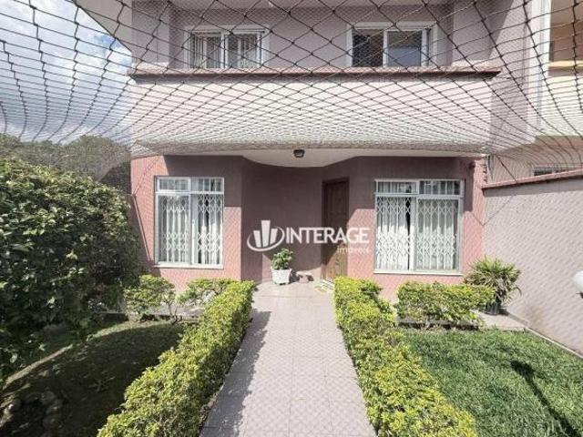 Sobrado com 4 dormitórios à venda, 141 m² por R$ 860.000,00 Novo Mundo Curitiba/PR