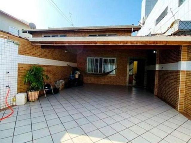 Sobrado com 4 dormitórios à venda, 163 m² por R$ 690.000,00 Ocian Praia Grande/SP