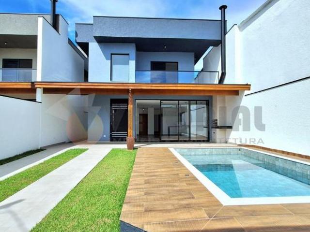 Sobrado com 4 dormitórios à venda, 172 m² por R$ 1.650.000,00 Capricórnio I Caraguatatuba/SP