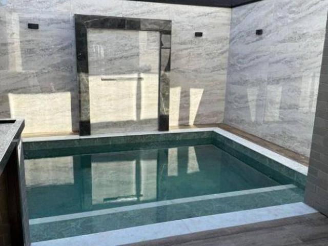 Sobrado com 4 dormitórios à venda, 204 m² por R$ 1.490.000,00 Boqueirão Praia Grande/SP