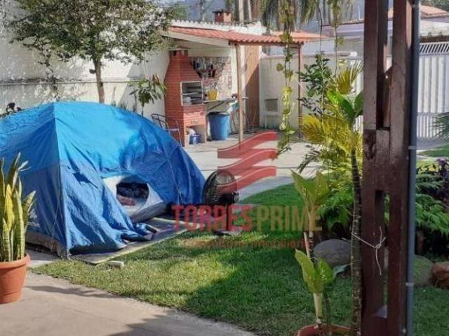 Sobrado com 4 dormitórios à venda, 200 m² por R$ 1.400.000,00 Canto do Forte Praia Grande/SP