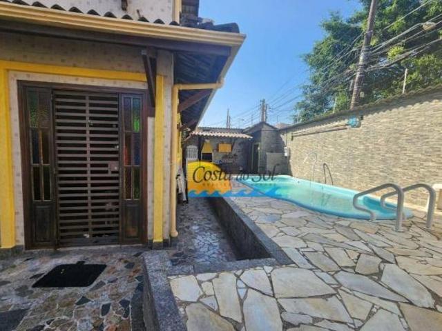 Sobrado com 4 dormitórios à venda, 211 m² por R$ 820.000,00 Aviação Praia Grande/SP